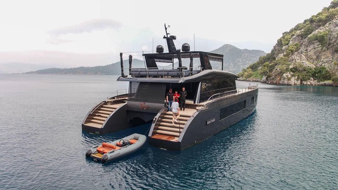 This Catamaran Has An All-Black Exterior To Fire Up Its Solar Panels ...
