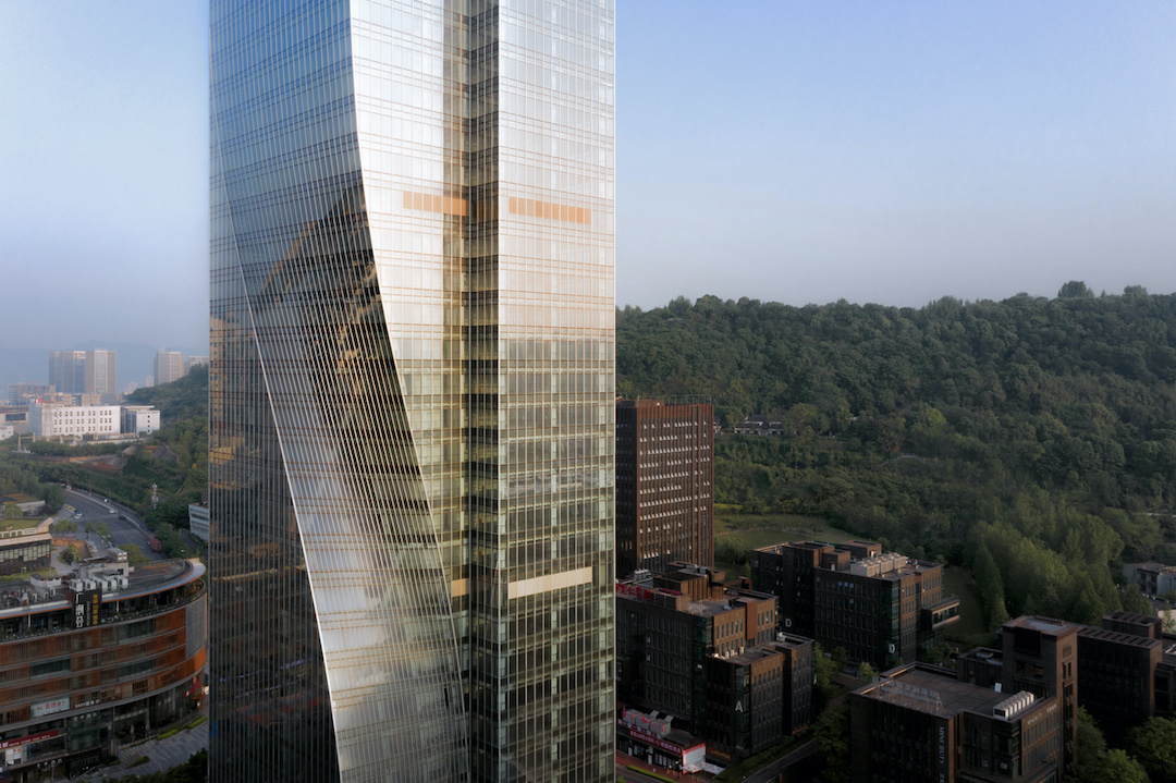 Twisted Skyscraper Spirals Into The Clouds In Chongqing, China ...